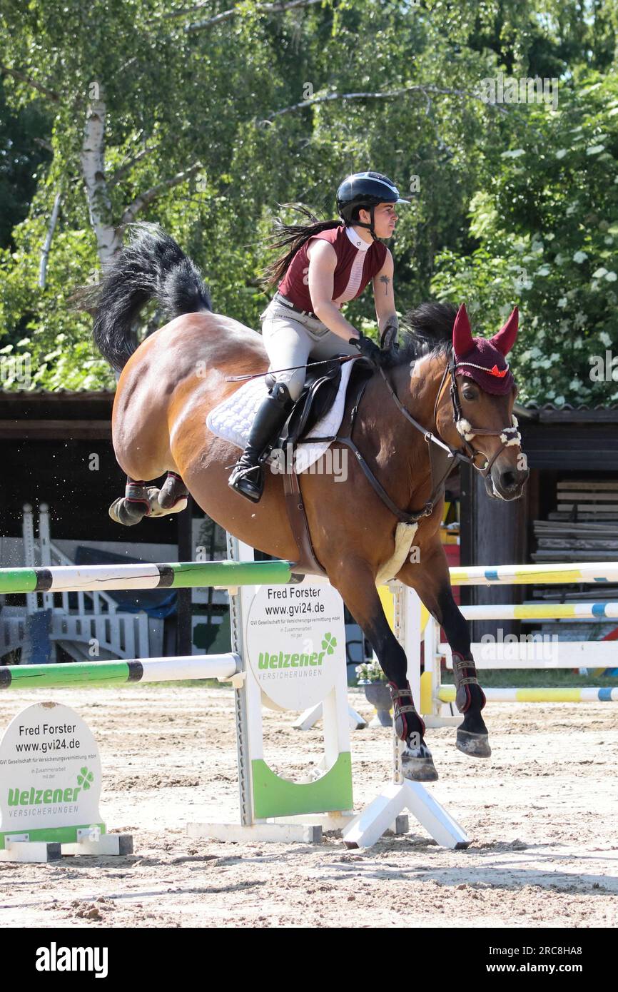 riders jump contest in germany Stock Photo - Alamy