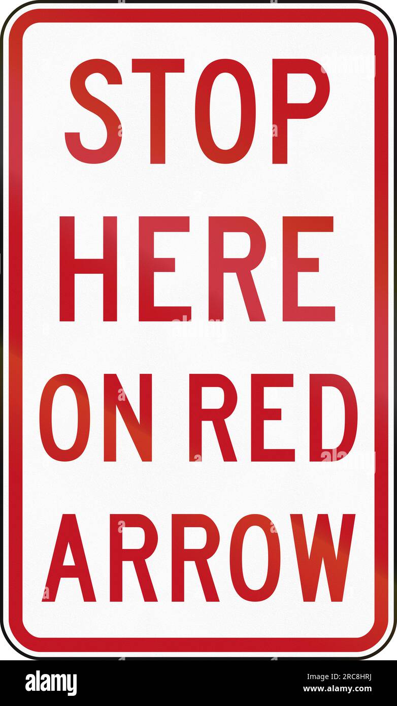 Australian regulatory sign - Stop here on red arrow Stock Photo - Alamy