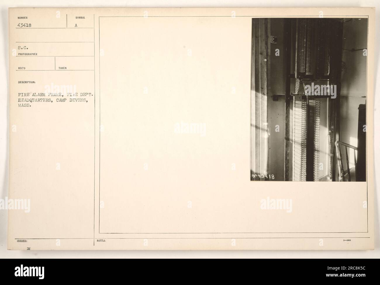 A photograph of a fire alarm frame at the fire department headquarters ...