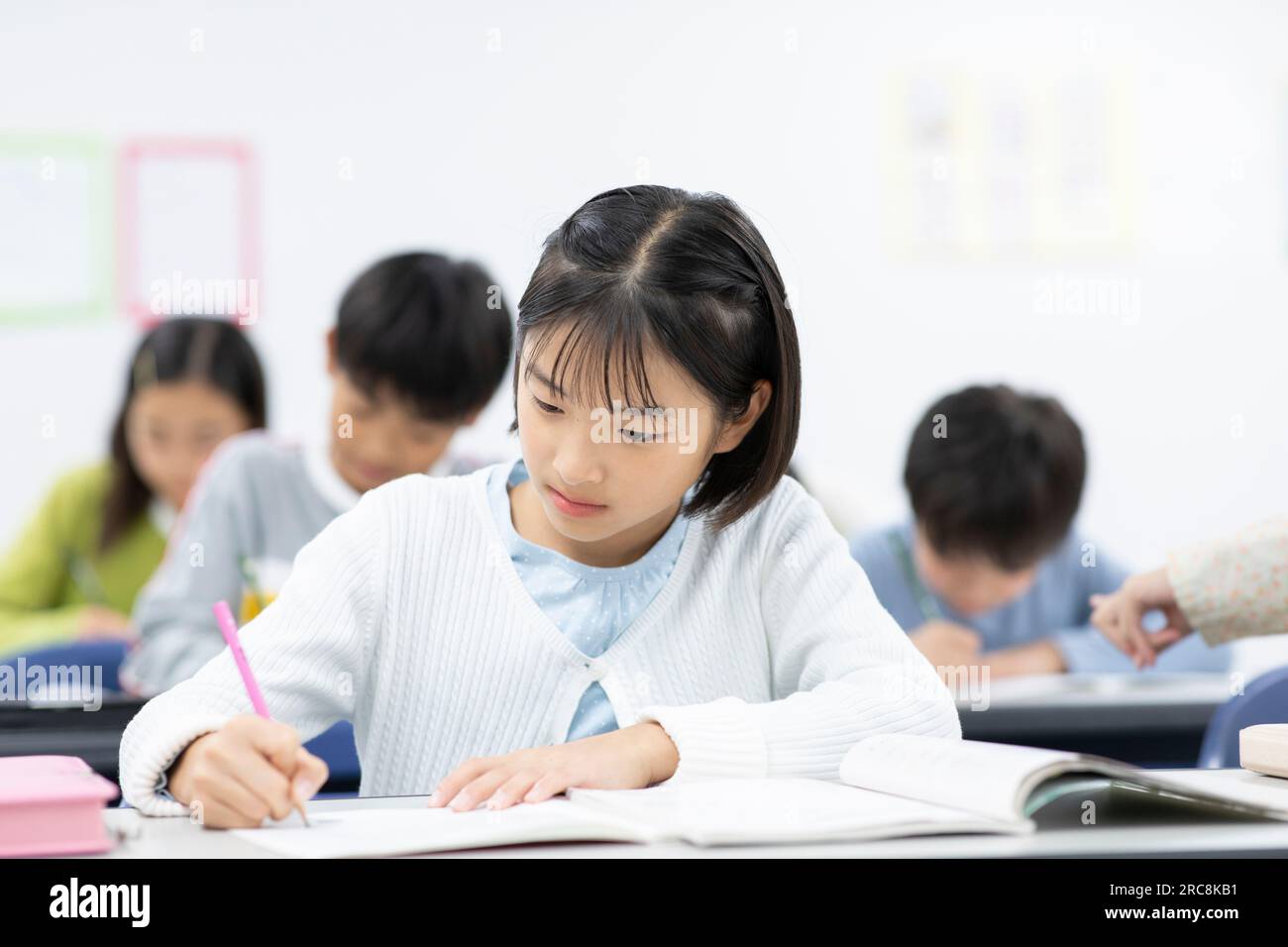 A Girl Studying Stock Photo - Alamy