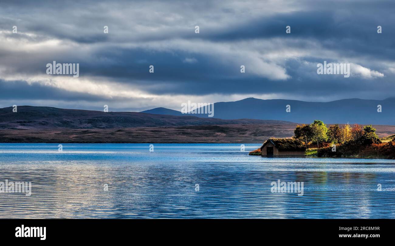The boat house on Loch Loyal Stock Photo - Alamy