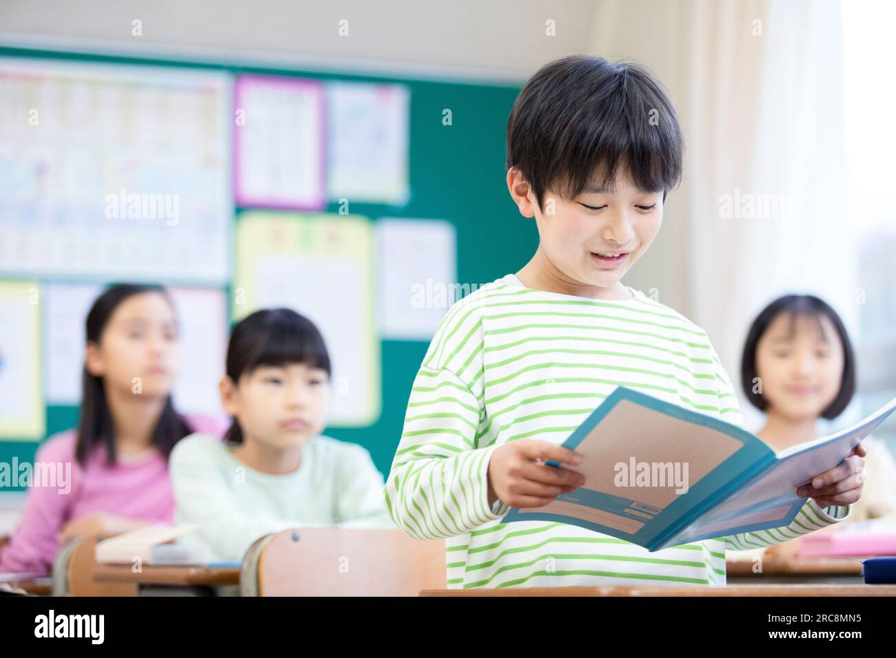 Elementary school student making a presentation Stock Photo - Alamy