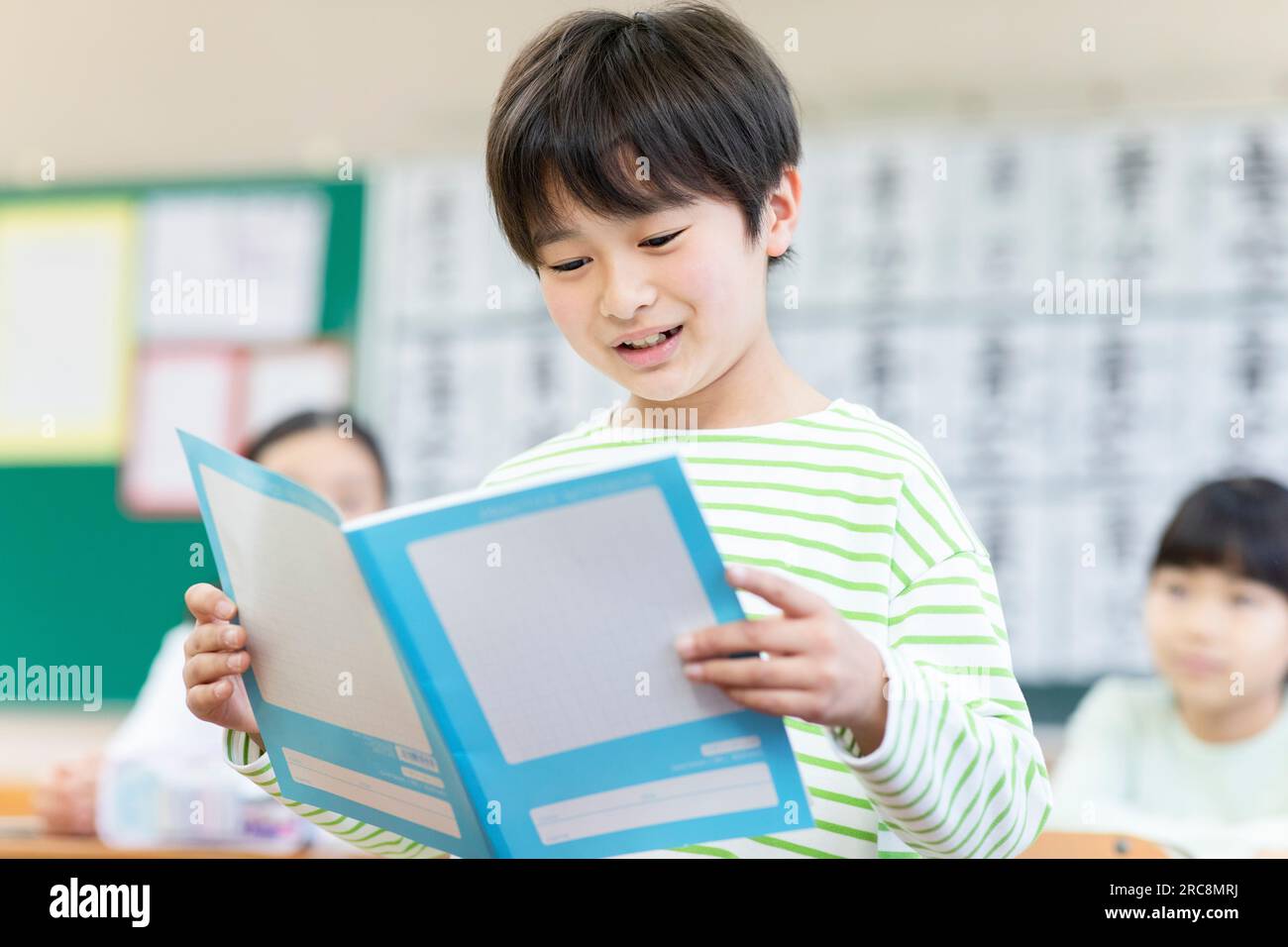 An elementary school student making a presentation Stock Photo - Alamy