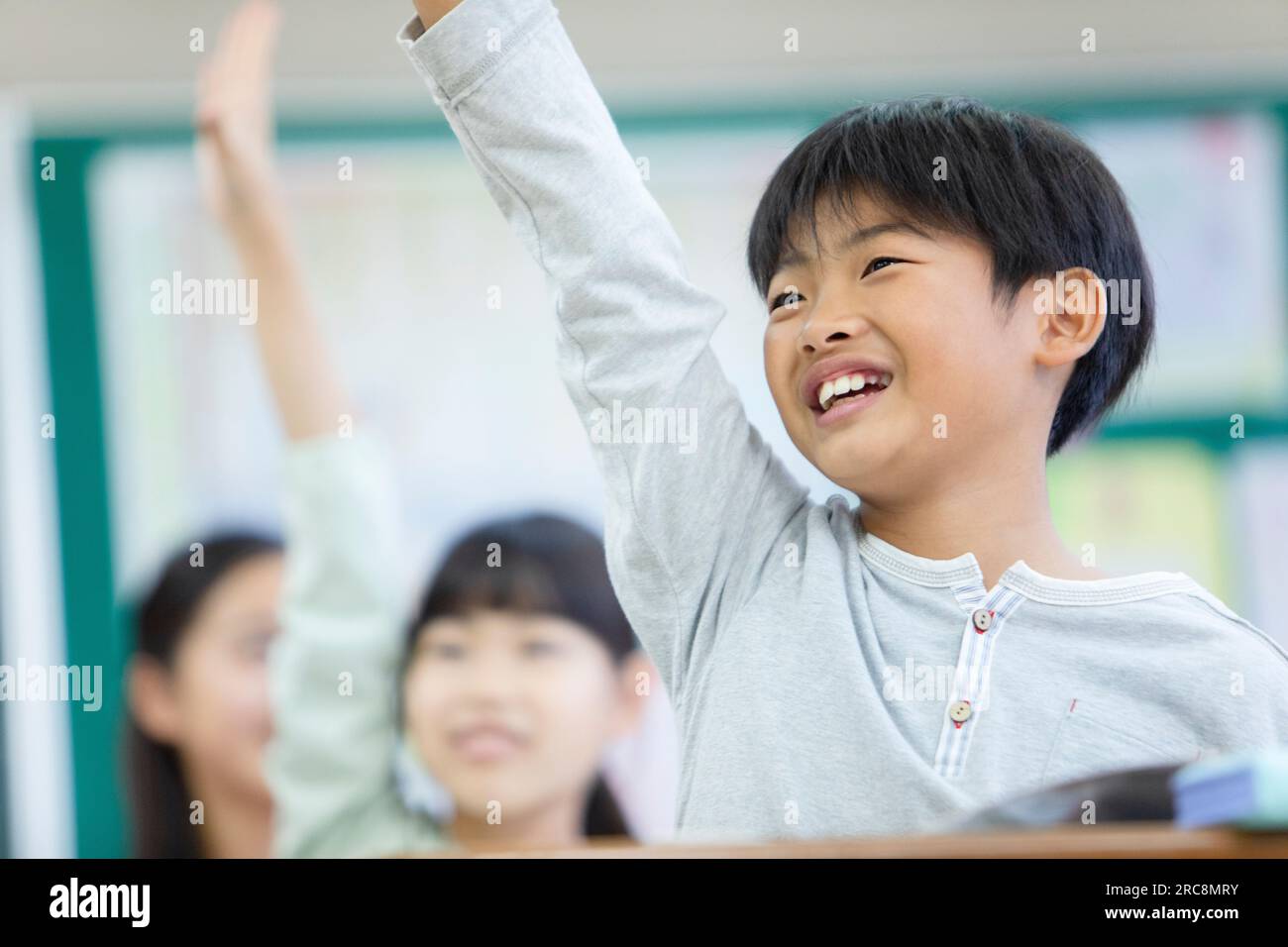 Boy raises hi-res stock photography and images - Alamy