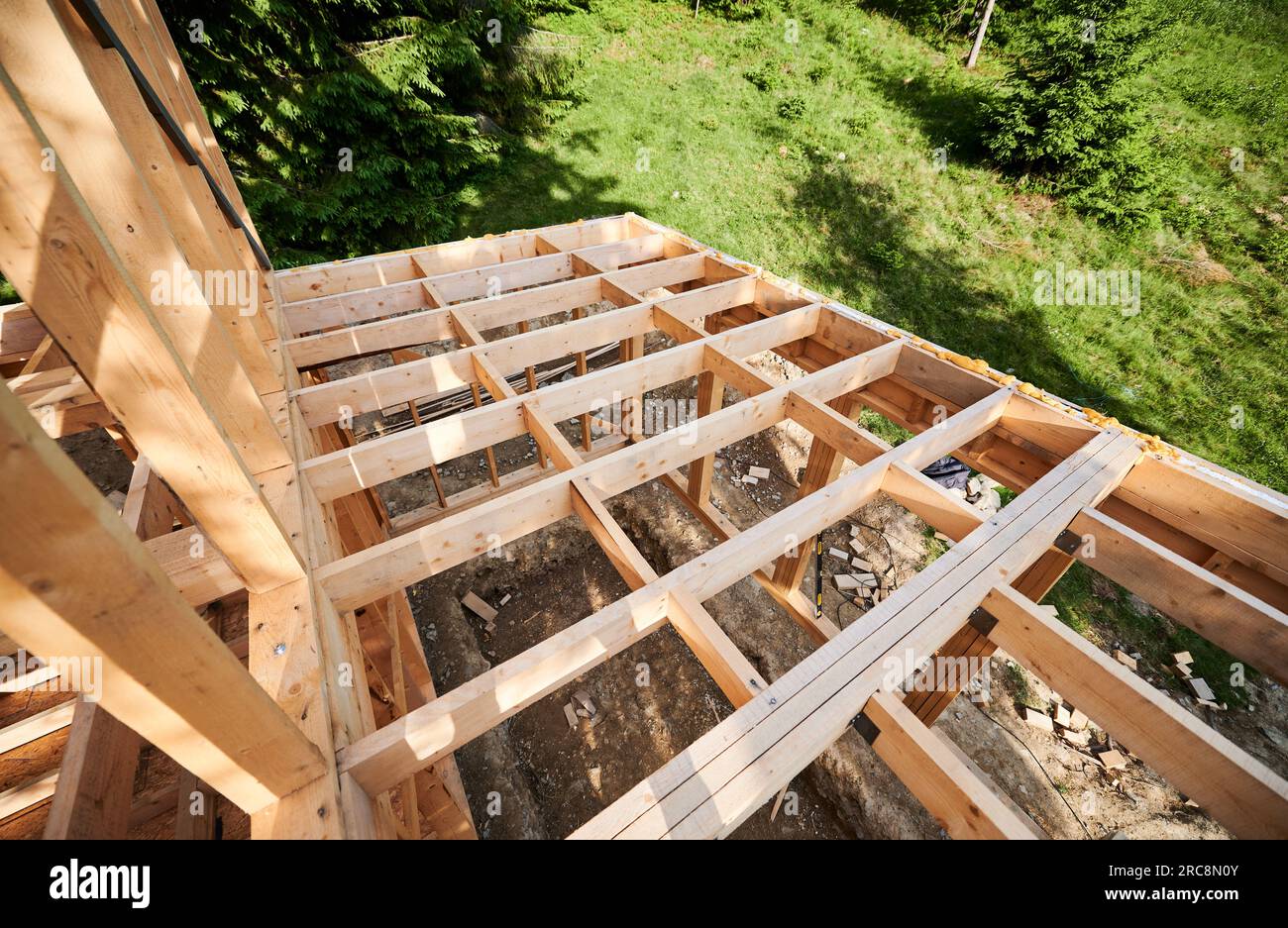 Under-construction residential wooden frame building. Initiation of new ...