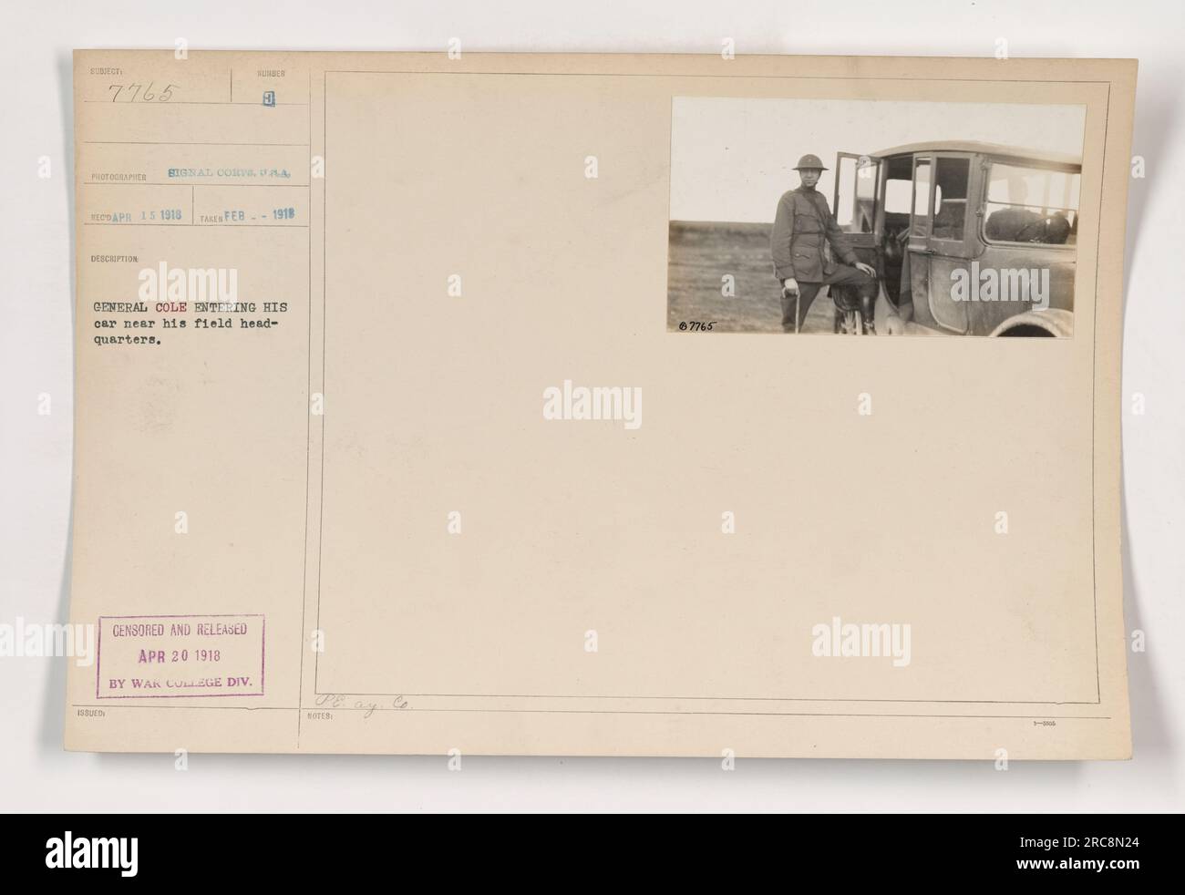 General Cole, a military figure during World War I, enters his car near ...