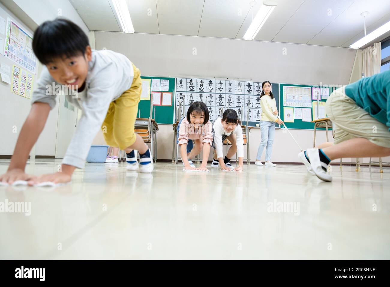 Students cleaning classroom hi-res stock photography and images - Alamy
