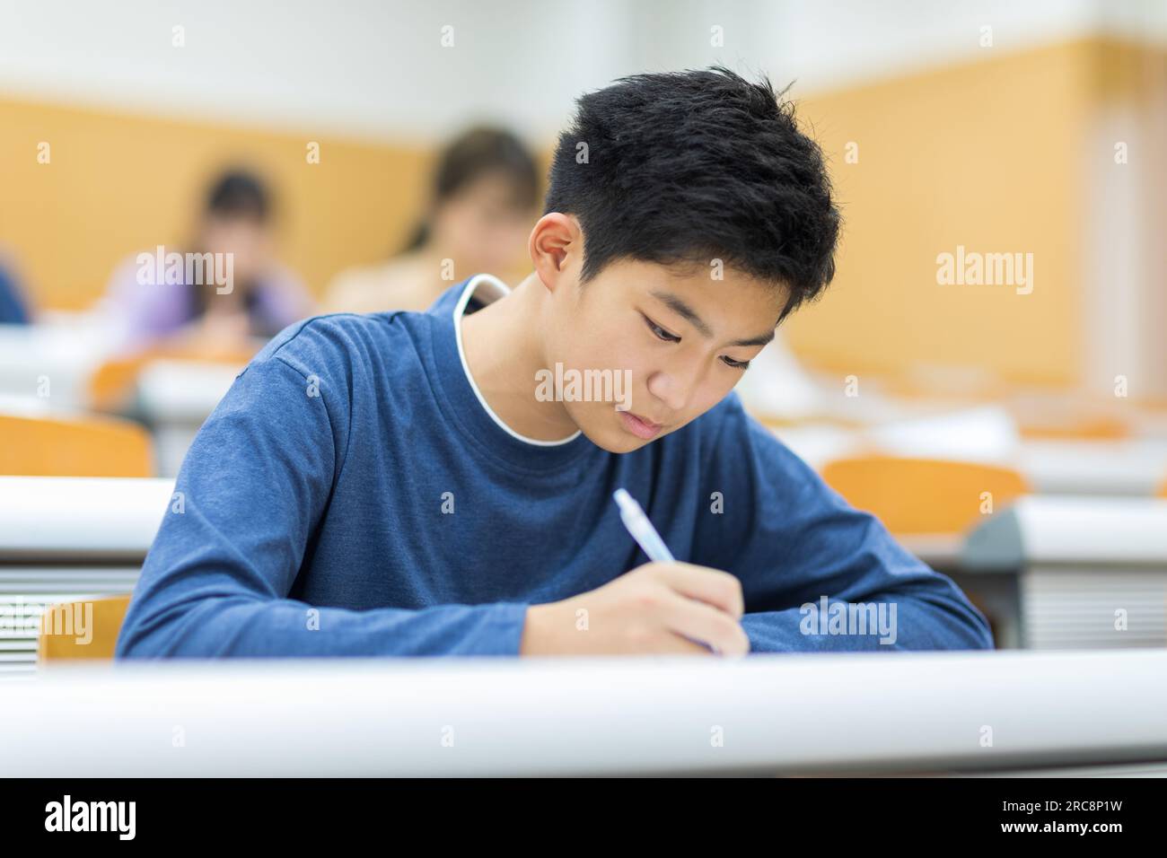 University students receiving a lecture Stock Photo - Alamy
