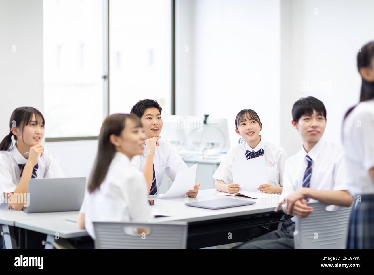 Students doing group work Stock Photo - Alamy