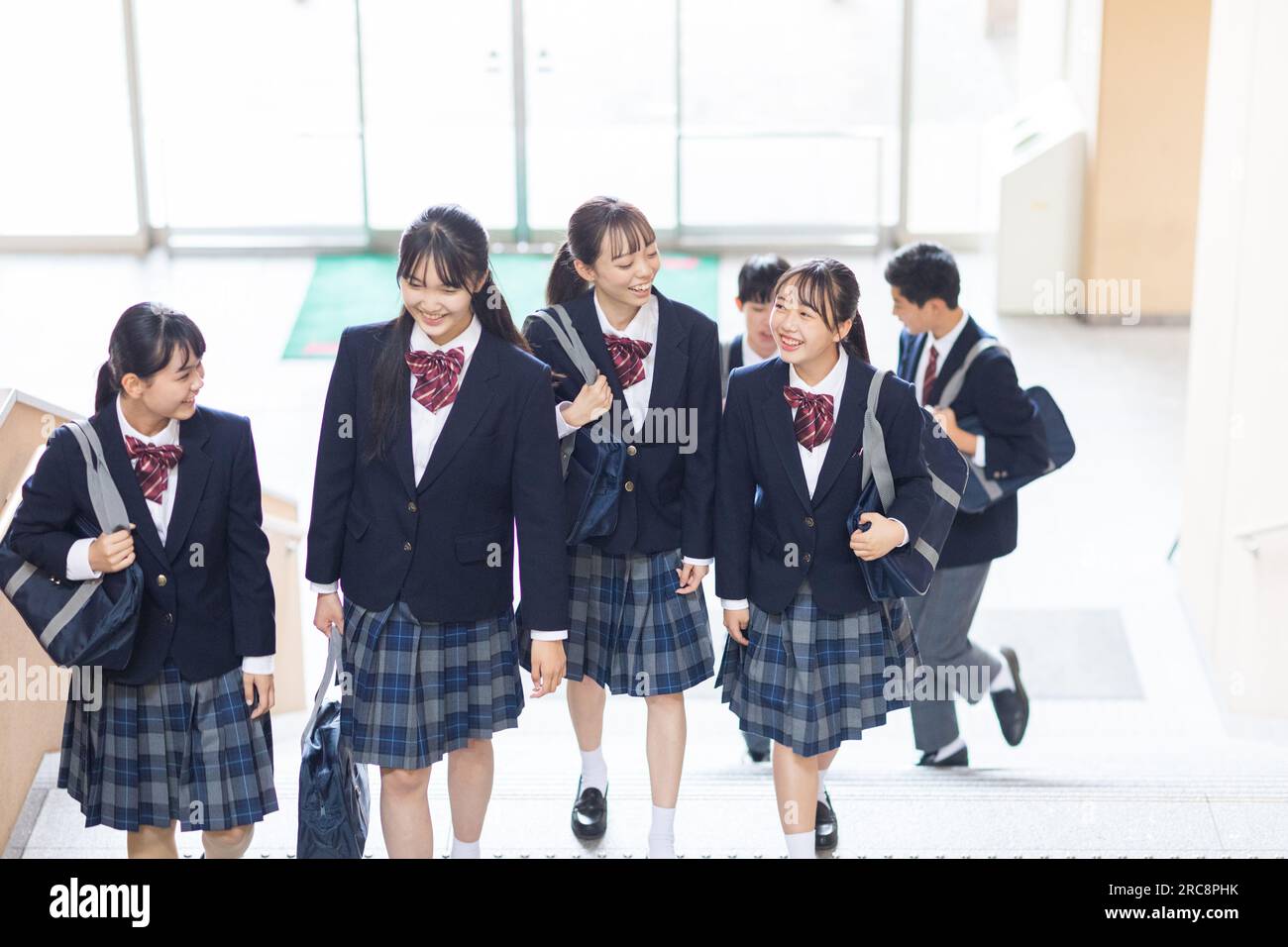 Group of people climbing stairs hi-res stock photography and images - Alamy