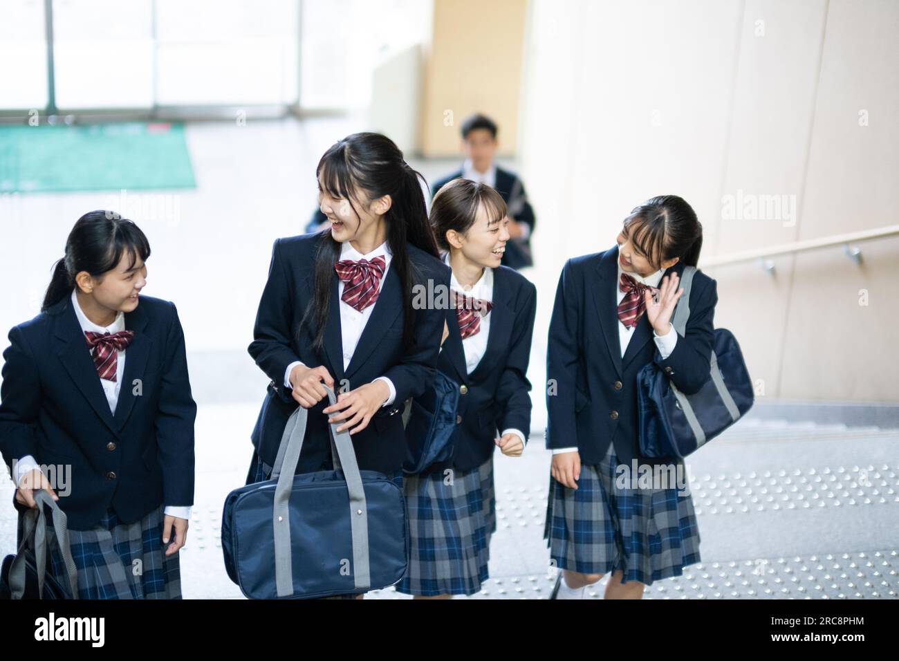 Group of people climbing stairs hi-res stock photography and images - Alamy