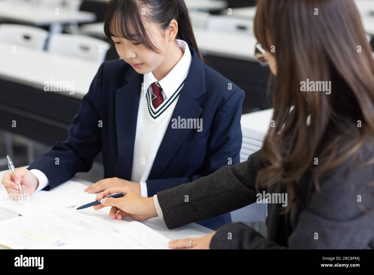 Student interviewing teacher hi-res stock photography and images - Alamy