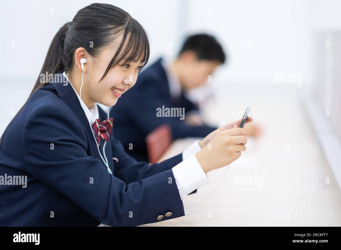 Student studying with a smart phone Stock Photo - Alamy