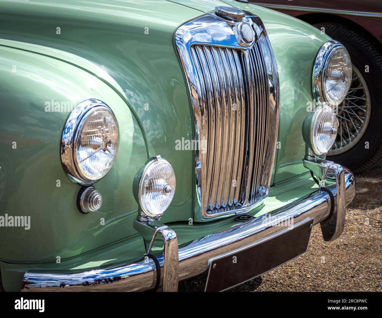 The bonnet of a green MG car Stock Photo - Alamy