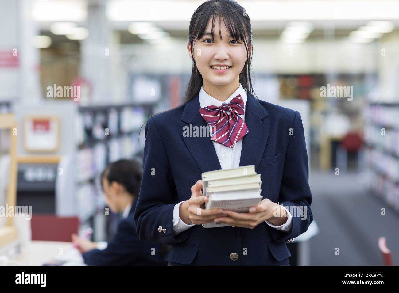 Student with a book Stock Photo - Alamy