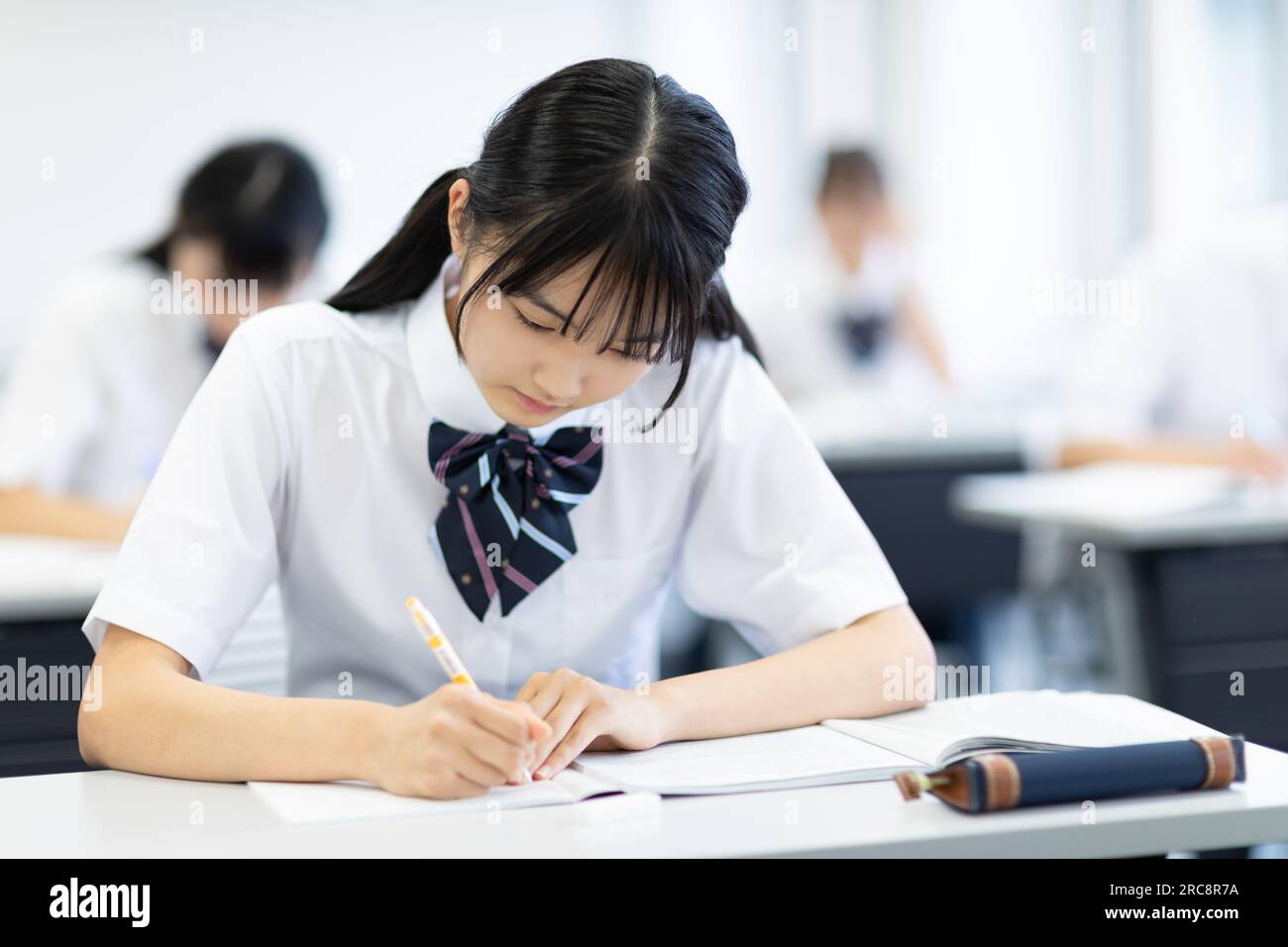 Student taking a class Stock Photo - Alamy