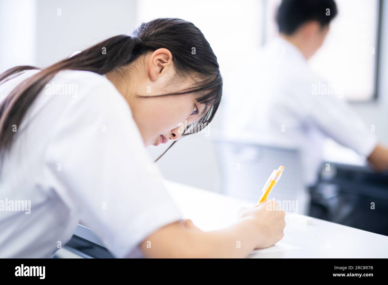 Student taking a class Stock Photo - Alamy