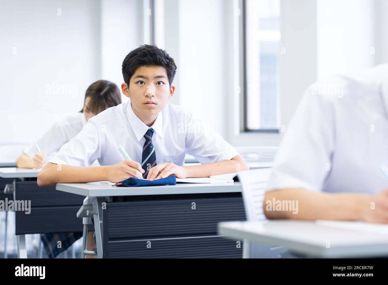 Student taking a class Stock Photo - Alamy