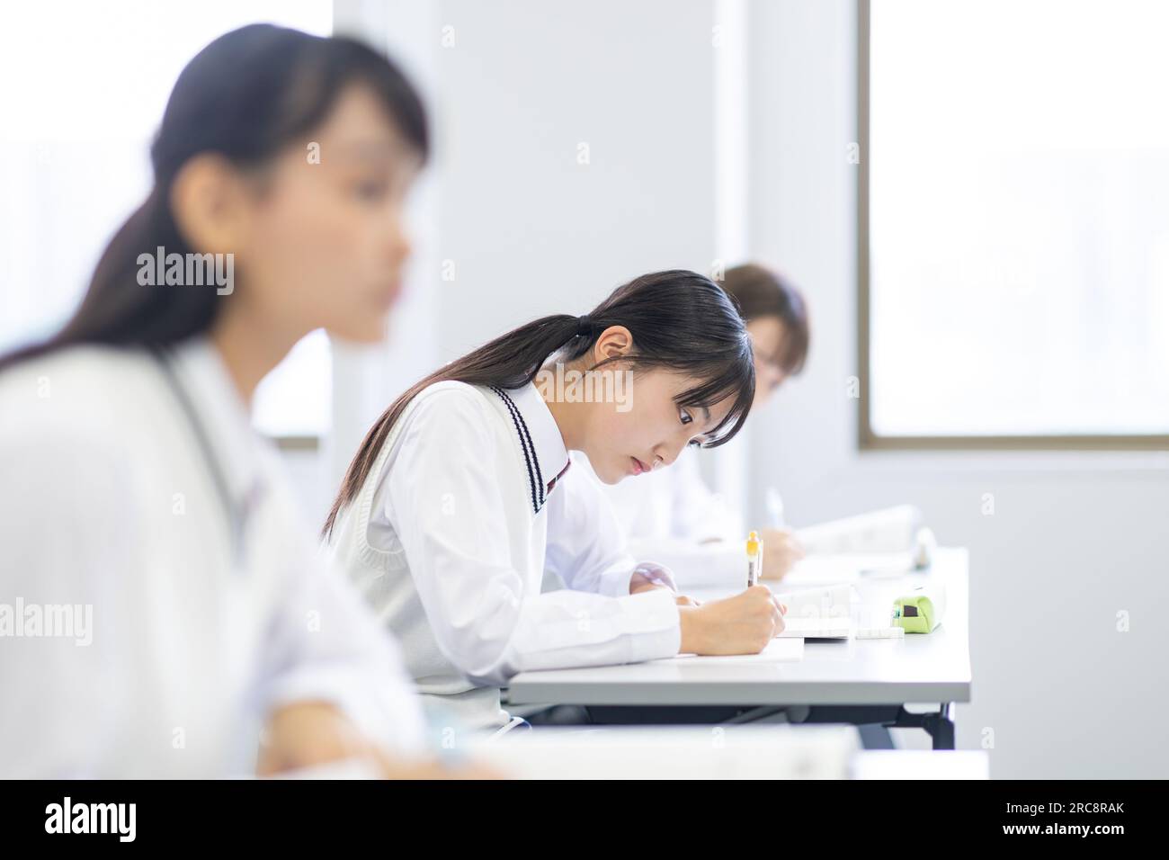 Students taking classes Stock Photo - Alamy