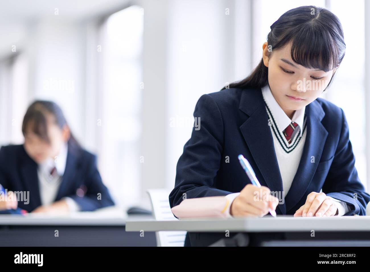 Students taking classes Stock Photo - Alamy