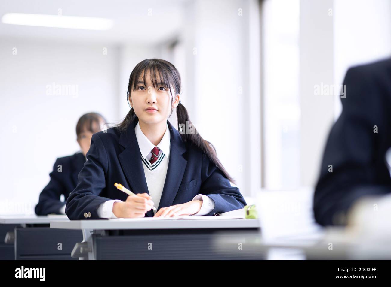 Students taking classes Stock Photo - Alamy