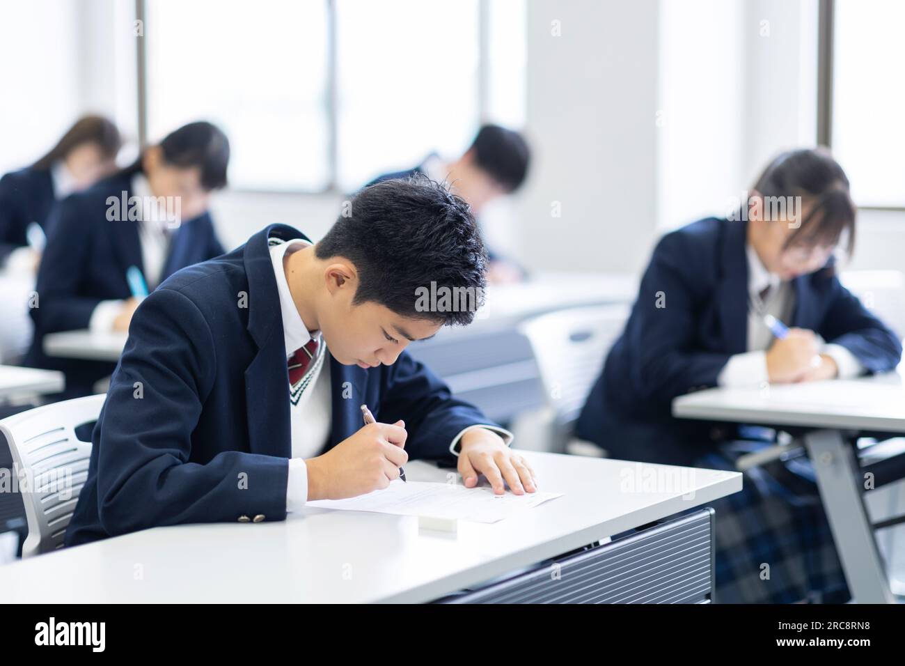 Boy and girl high taking test hi-res stock photography and images - Alamy