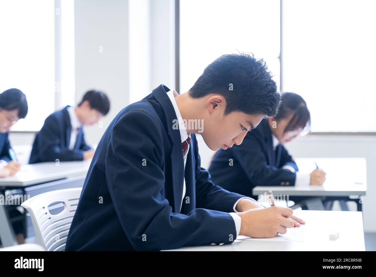 Students taking classes Stock Photo - Alamy