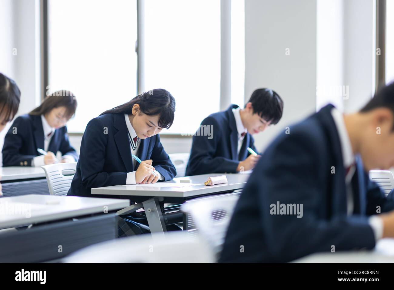 Boy and girl high taking test hi-res stock photography and images - Alamy