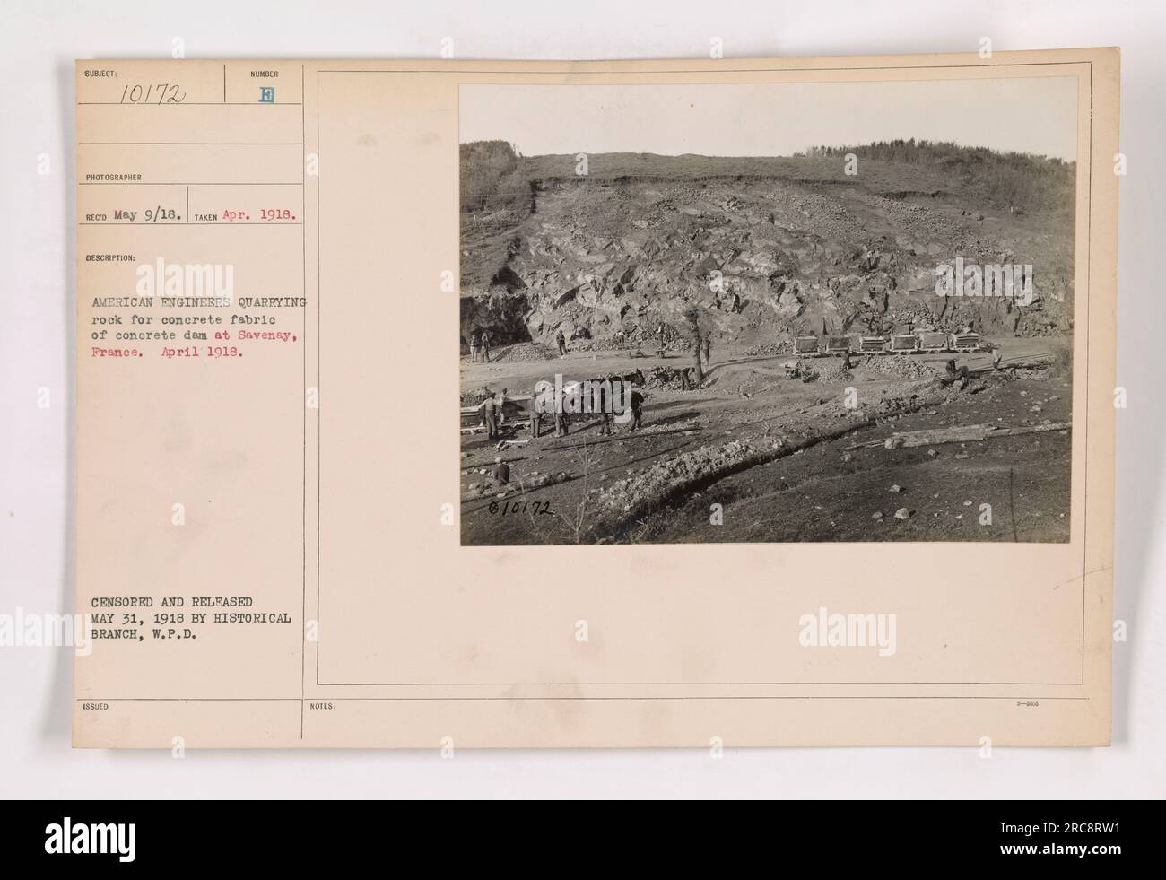 American engineers working to quarry rock for the construction of a ...