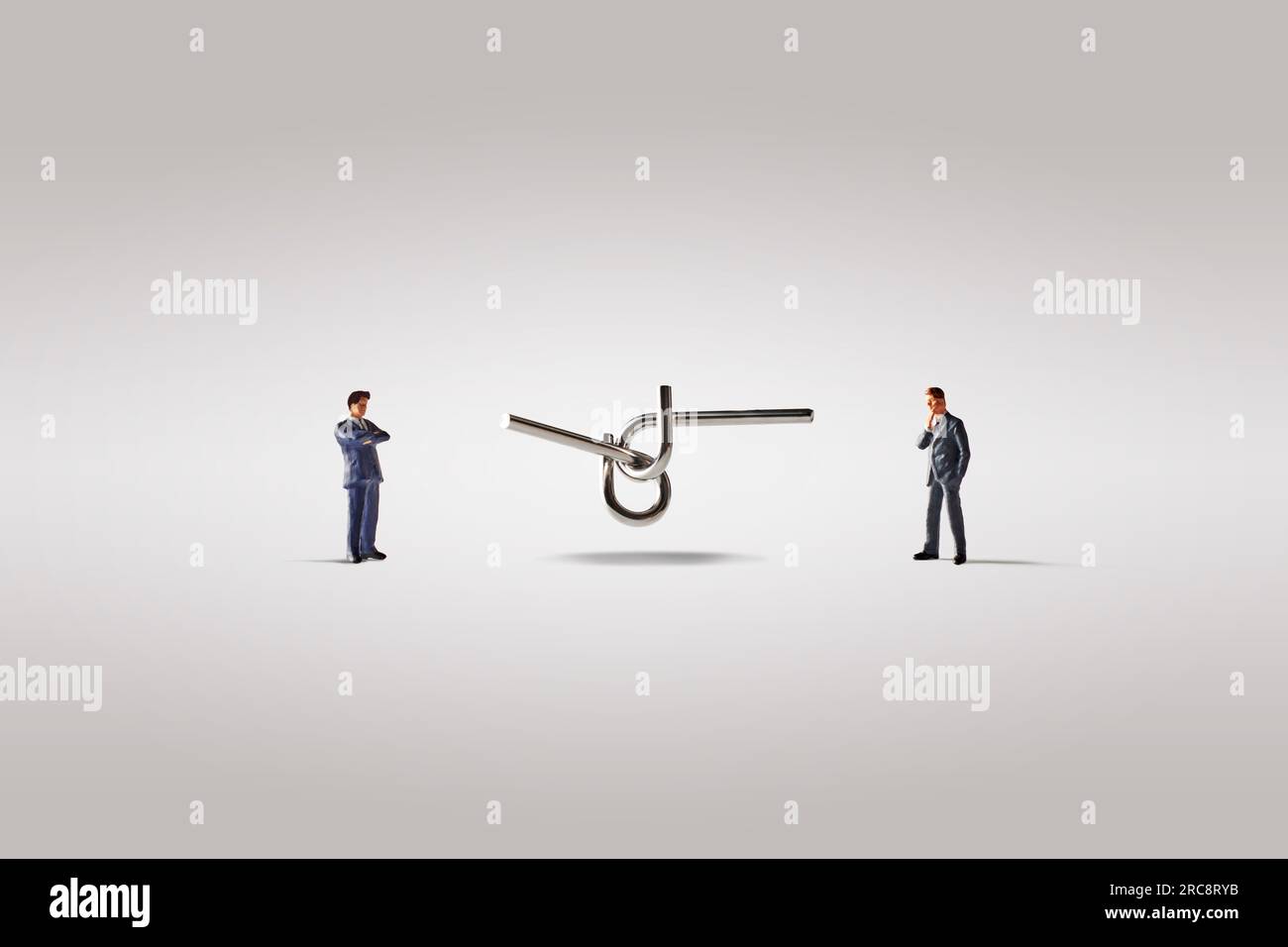 Businessman with the Wheel of Wisdom Stock Photo - Alamy