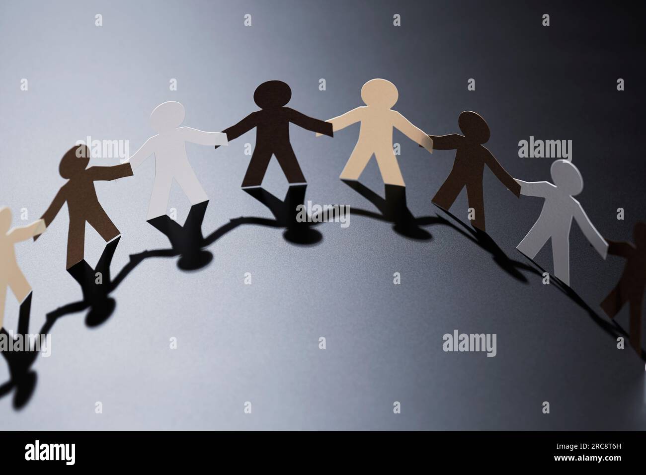 Dolls holding hands Stock Photo - Alamy
