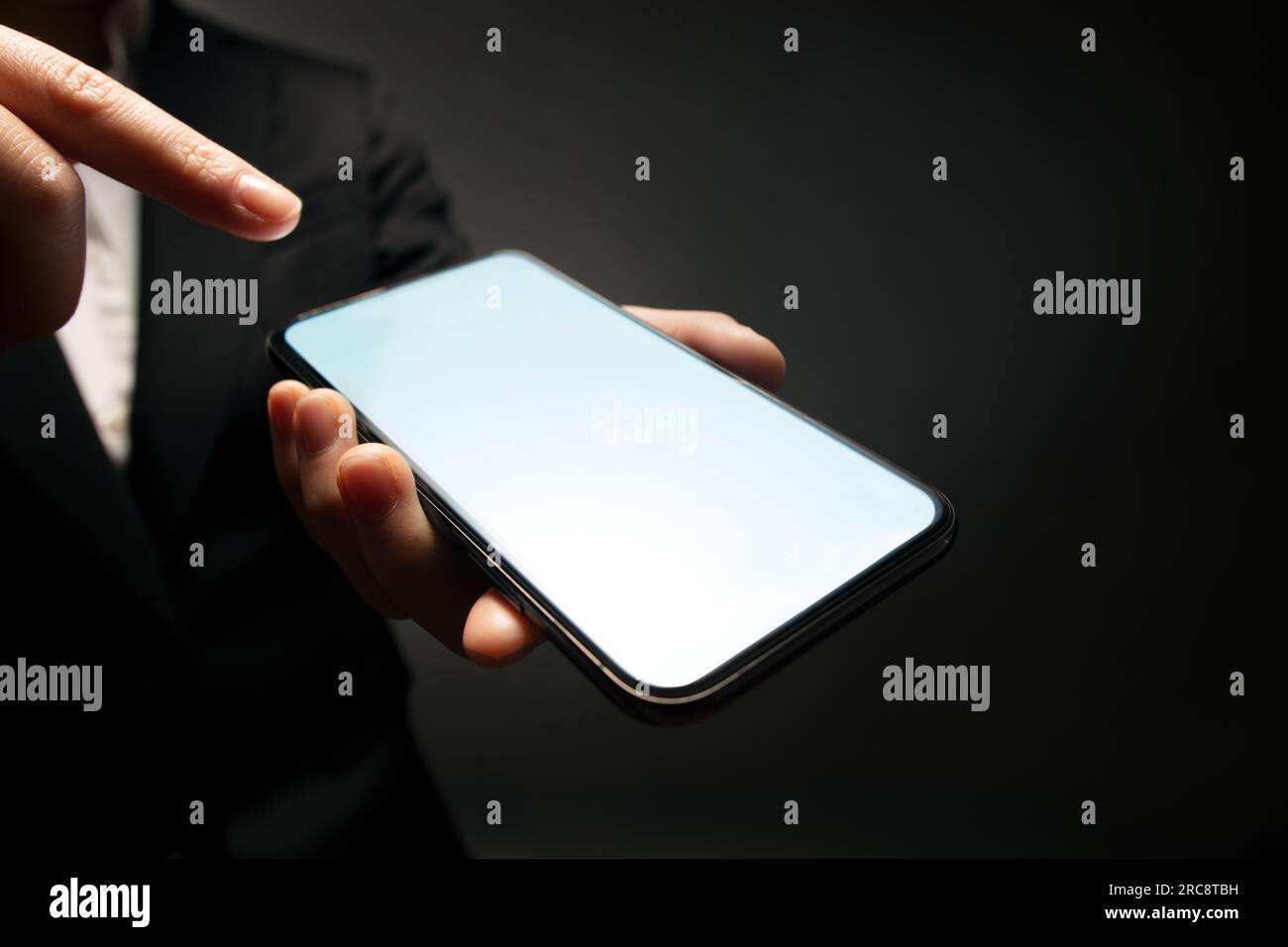 Hand with Smartphone Stock Photo - Alamy
