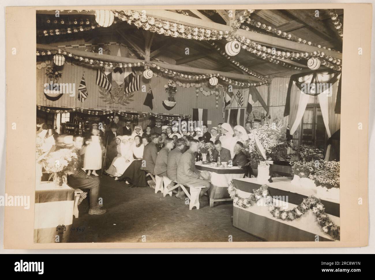 Soldiers driving tanks through a wartime landscape during World War I ...
