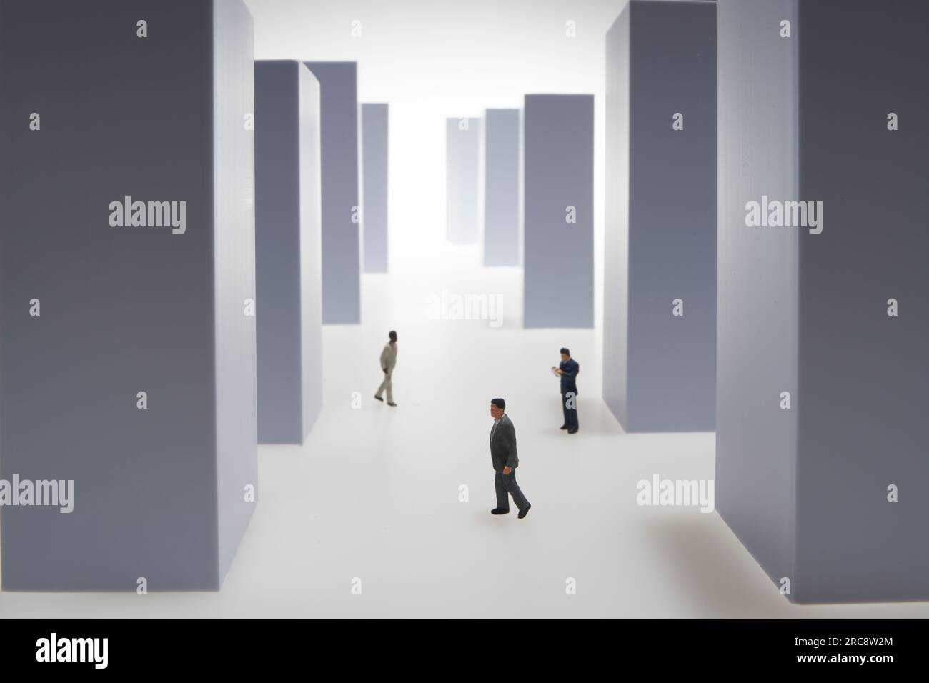 Buildings and miniature office workers Stock Photo - Alamy