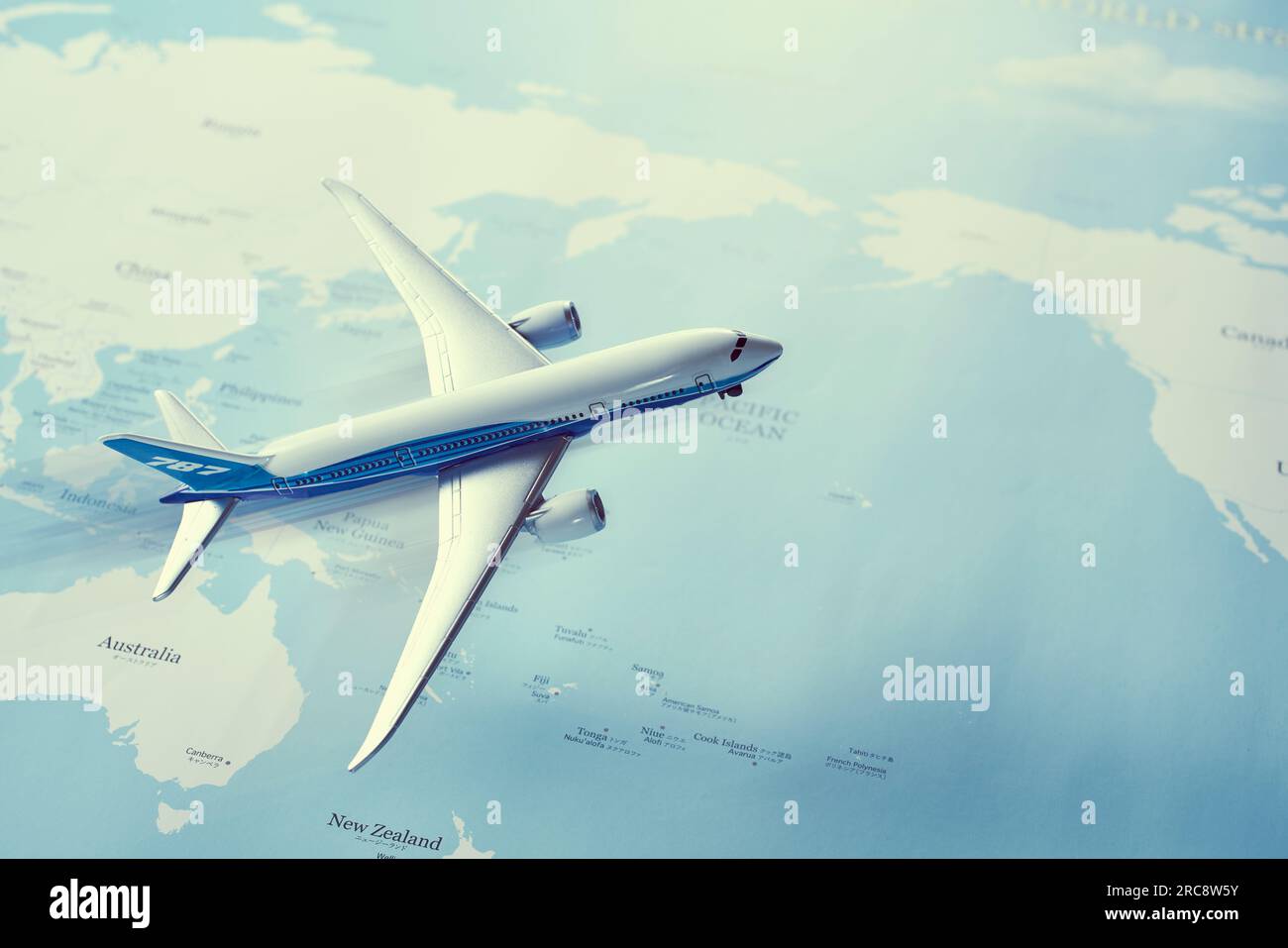 Miniature airplane on world map Stock Photo - Alamy
