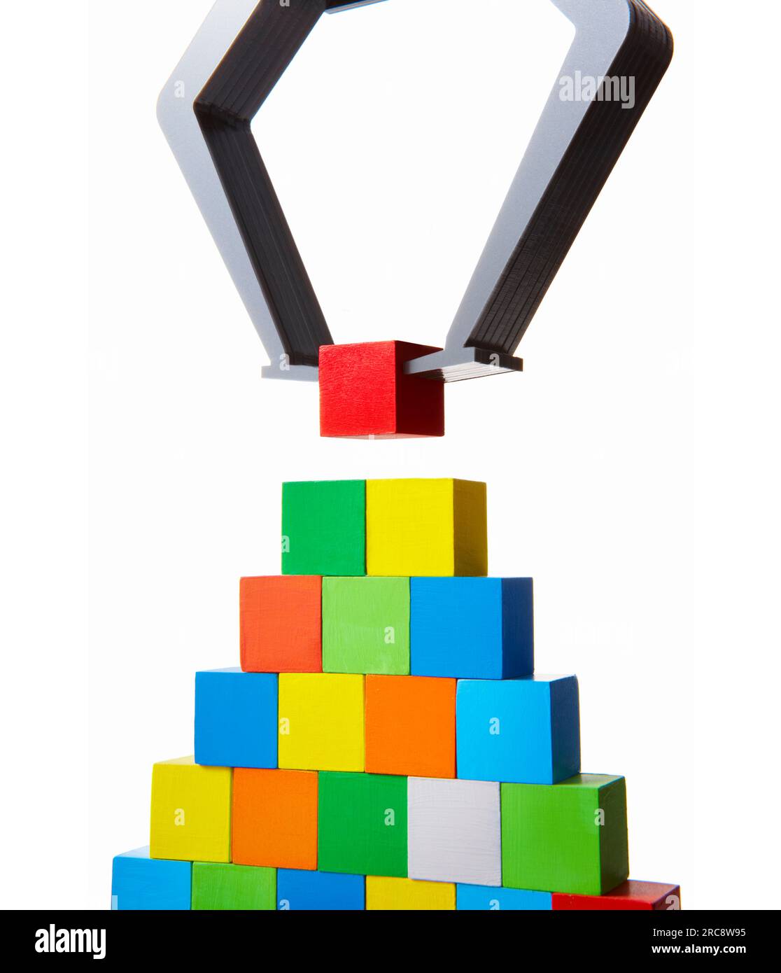 Robot arm and colorful building blocks Stock Photo - Alamy