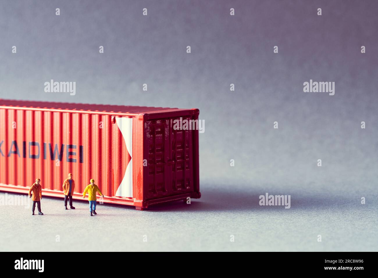 People working with miniature containers Stock Photo - Alamy