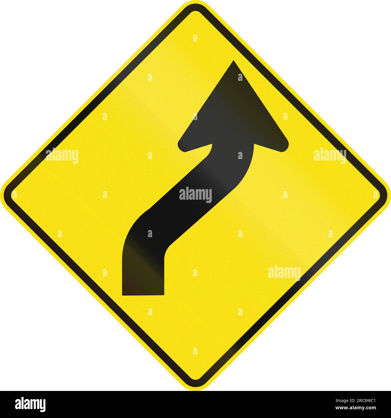 Australian road warning sign - Reverse curve Stock Photo - Alamy