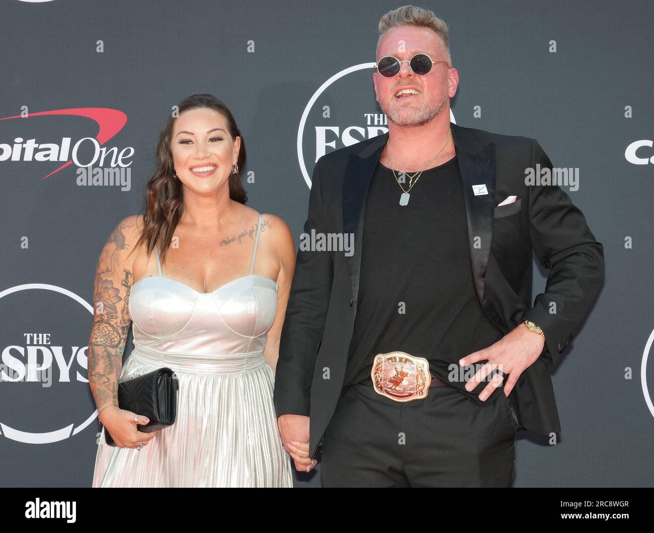 Los Angeles, USA. 12th July, 2023. (L-R) Samantha McAfee and Pat McAfee ...