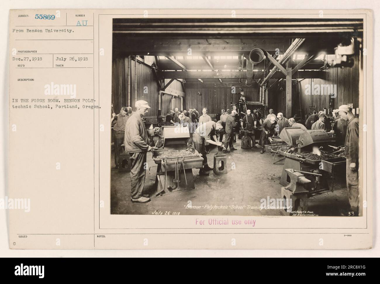 Soldiers are seen working in the forge room at Benson Polytechnic ...