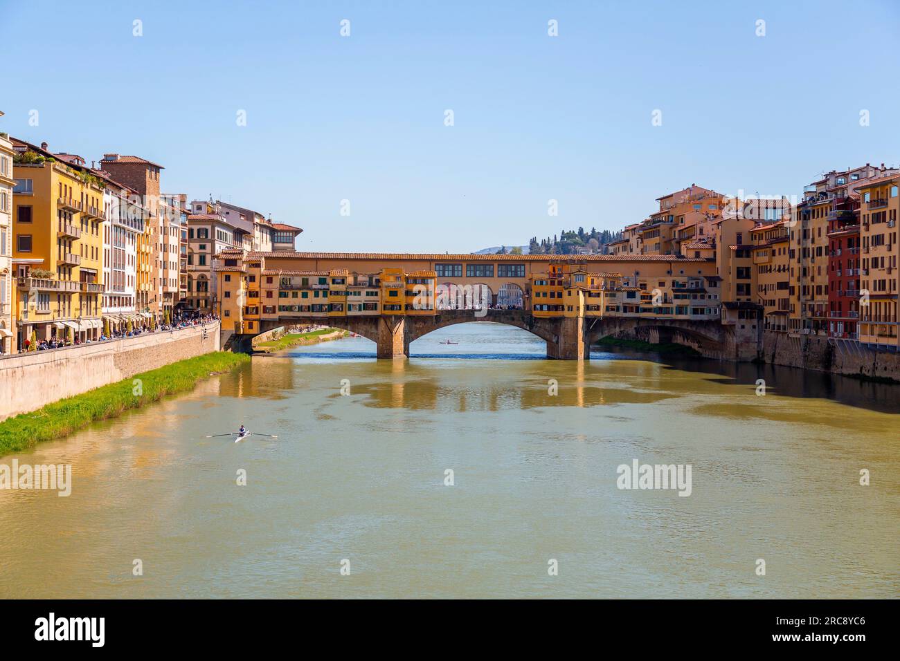 Florence, Italy - April 5, 2022: The Ponte Vecchio is a medieval stone ...