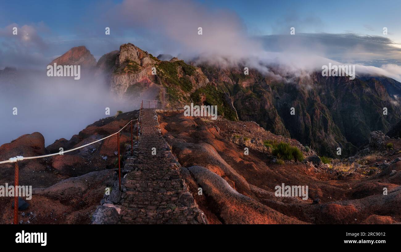 Landscape of sunrise in mountain over clouds in Madeira Island on Pico ...