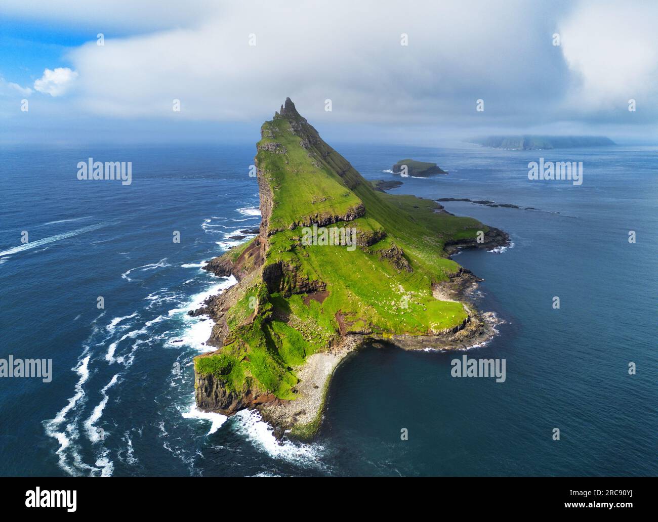 Tindholmur on Faroe Islands Vagar, aerial drone view during day in ...