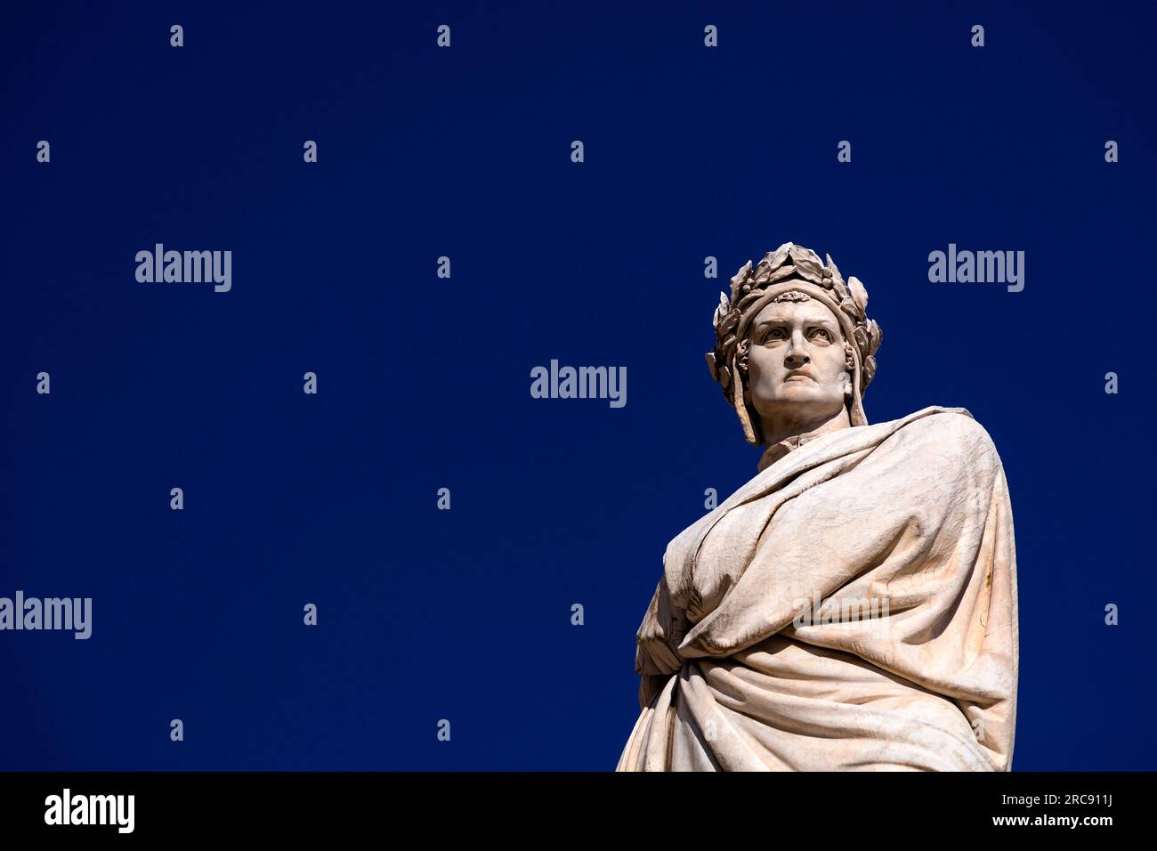 Florence, Italy - April 5, 2022: Marble statue of Dante Alighieri at ...