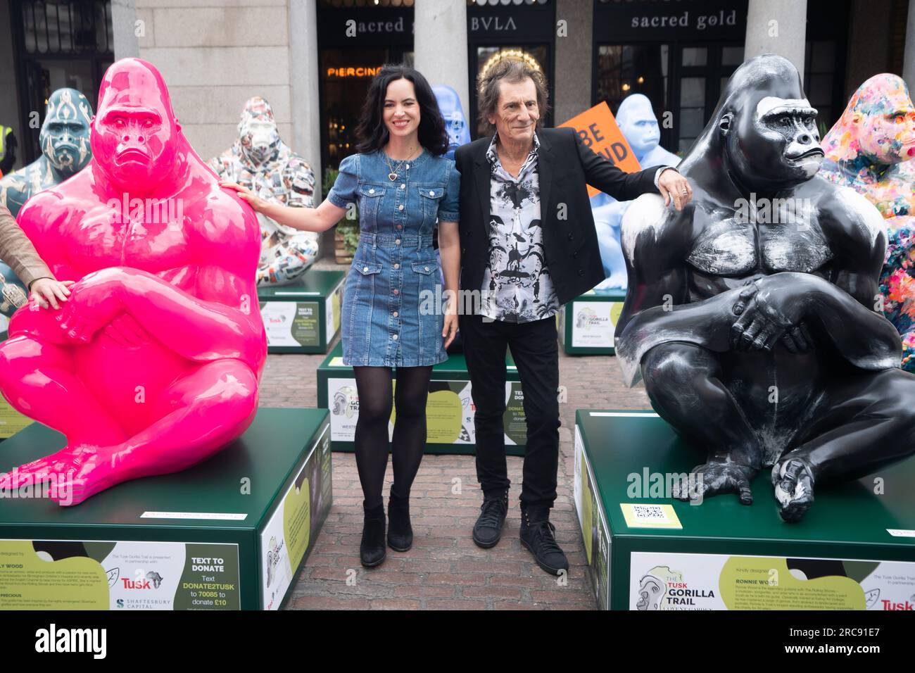 Sally Wood and Ronnie Wood stand next to their Gorilla's at the launch ...
