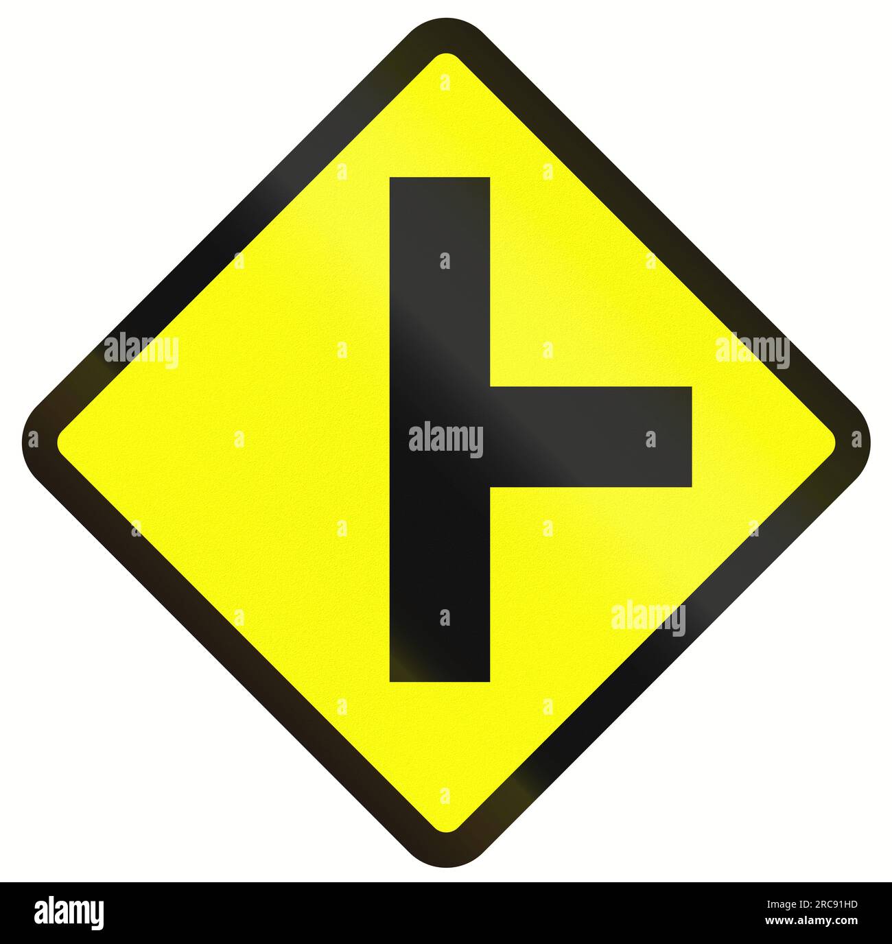 Indonesian road warning sign: T-Intersection ahead Stock Photo - Alamy