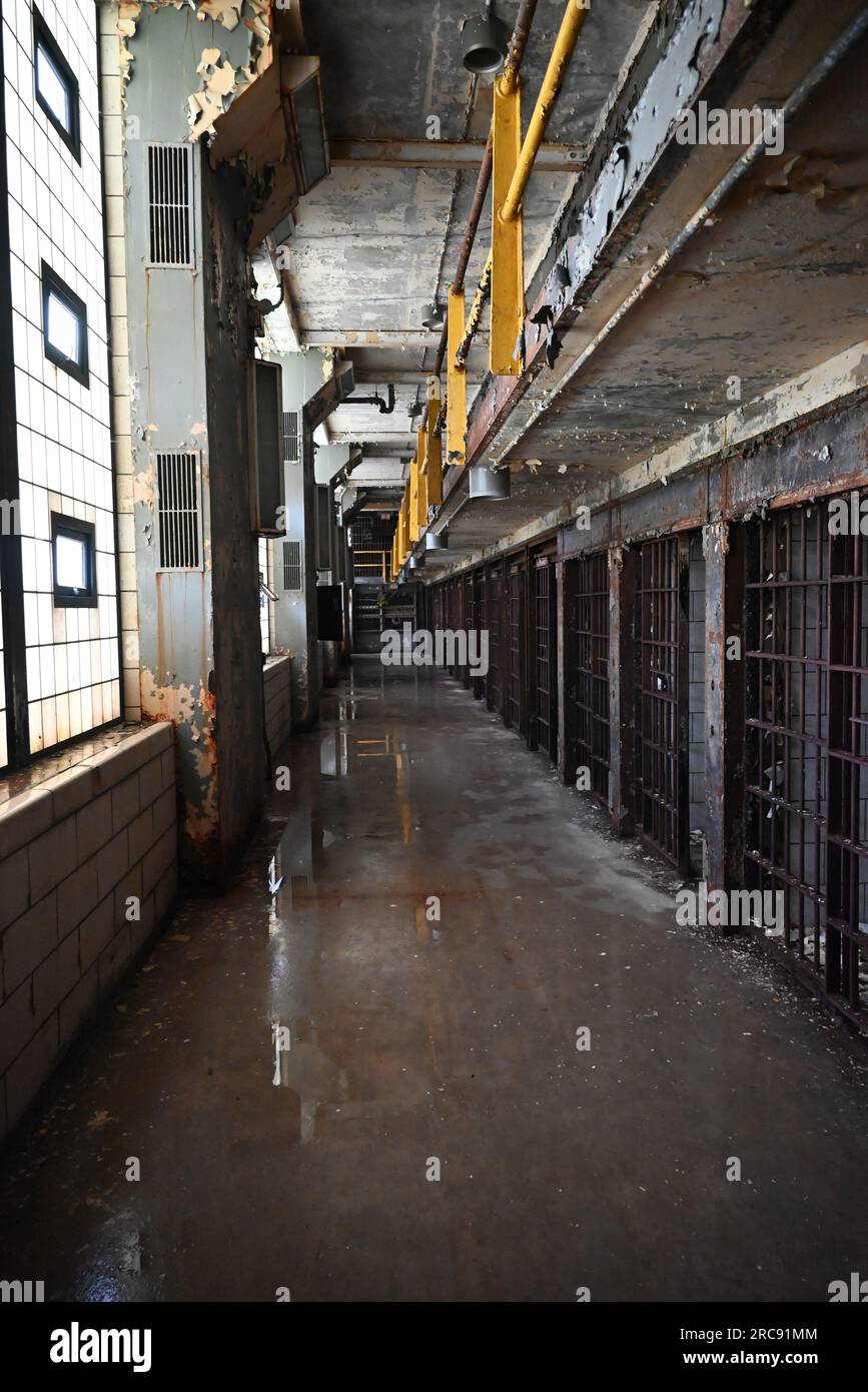 Looking down a row of prison cells in the East Cell Block of the Old ...