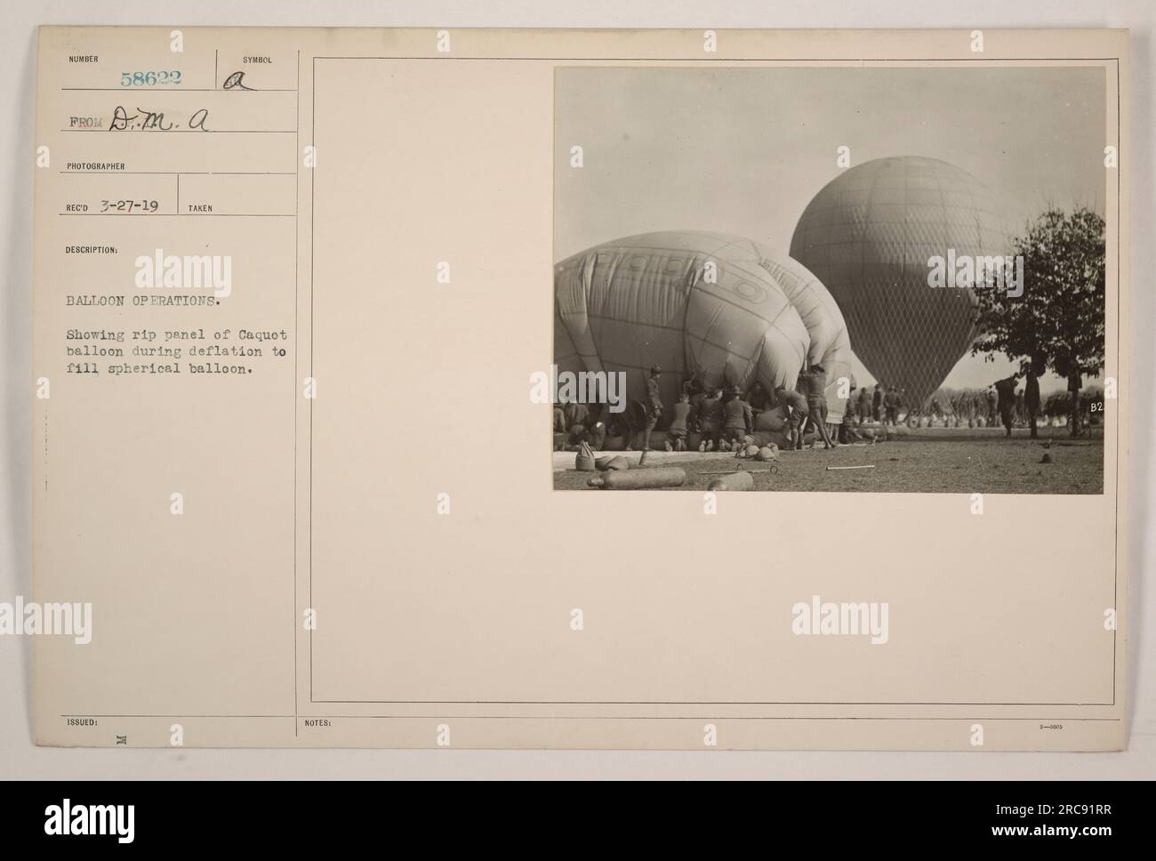 Caquot balloon being deflated and showing rip panel during a balloon ...