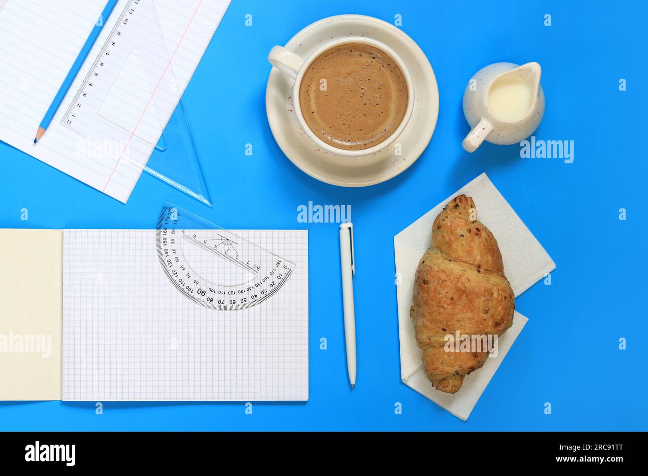 Top view of the desktop of a female student, office worker or engineer ...