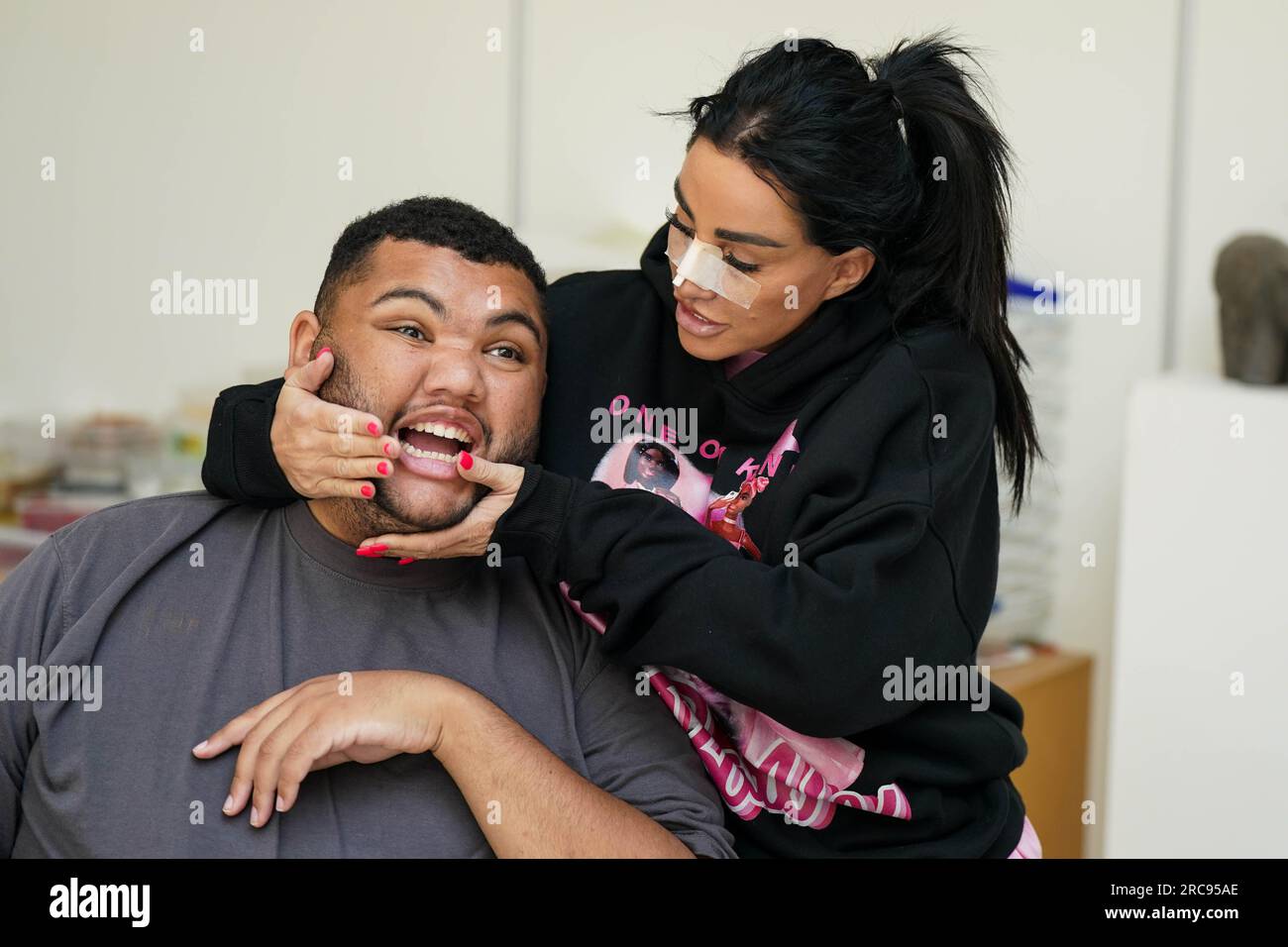 Katie Price and her son Harvey, after he was presented with the ...